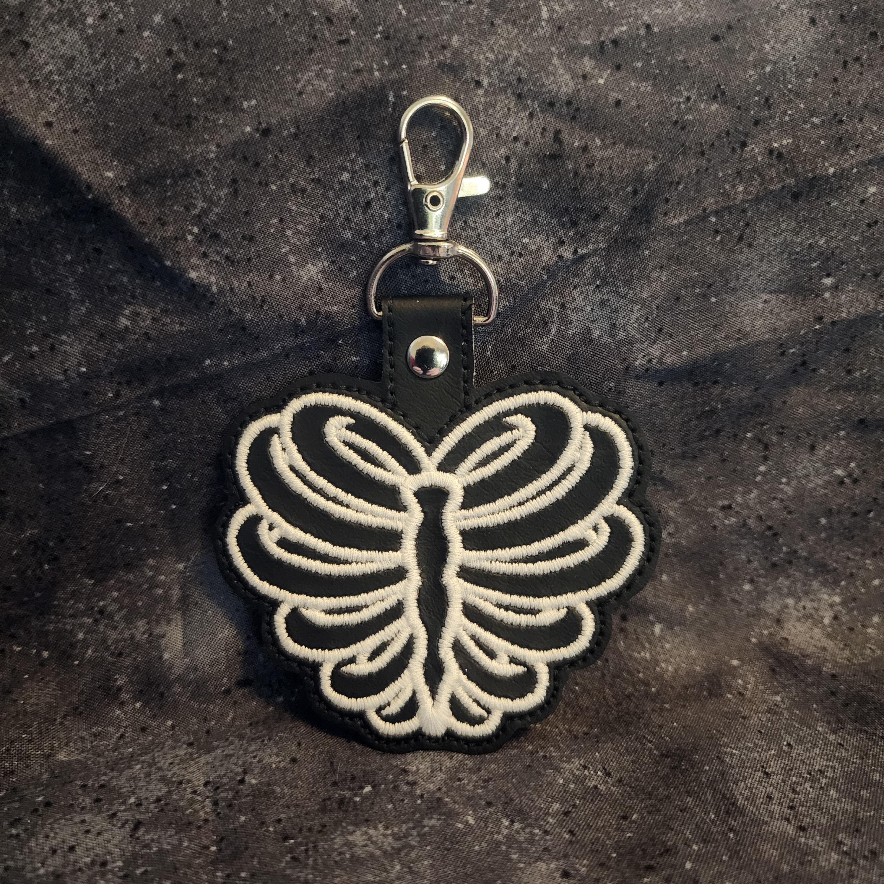 Rib Cage Heart Embroidered Keychain | WHERE DARK THREADS LIE | Grave Shade